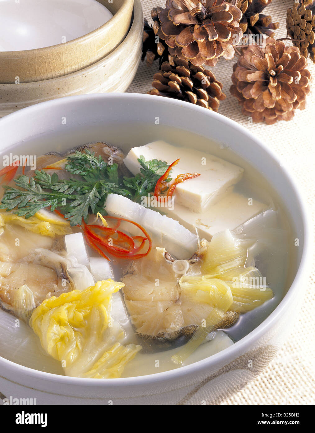 Korean cooking - soup, stew and table setting Stock Photo - Alamy