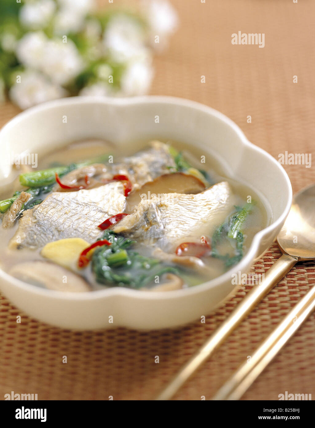 Korean cooking - soup, stew and table setting Stock Photo - Alamy