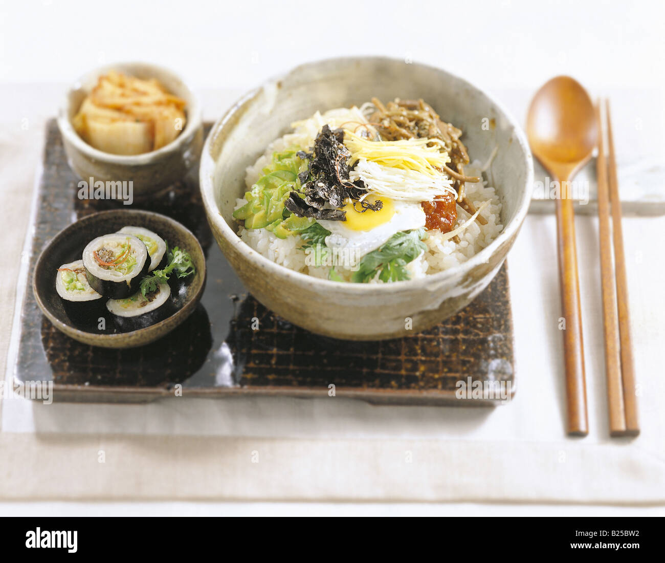Korean food - mixed vegetables on rice Stock Photo - Alamy