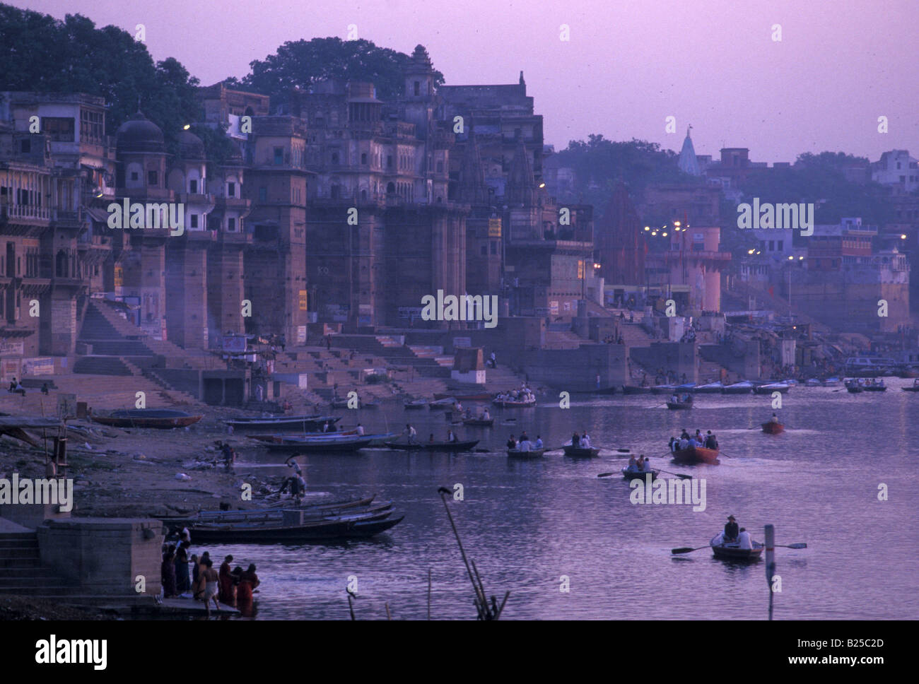 The ghats on the Holy ganges at dawn Stock Photo - Alamy