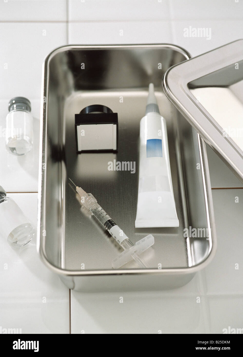 Needle and cream Stock Photo - Alamy