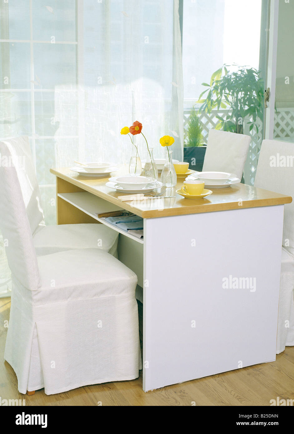 Table and chairs in the dining room Stock Photo - Alamy