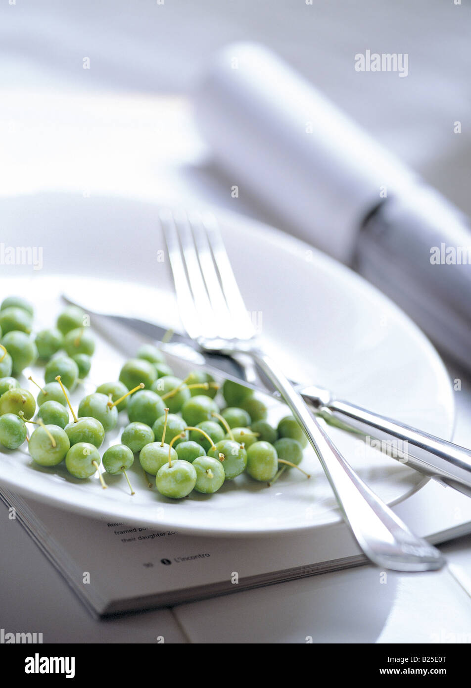 Pea, fork and spoon Stock Photo - Alamy