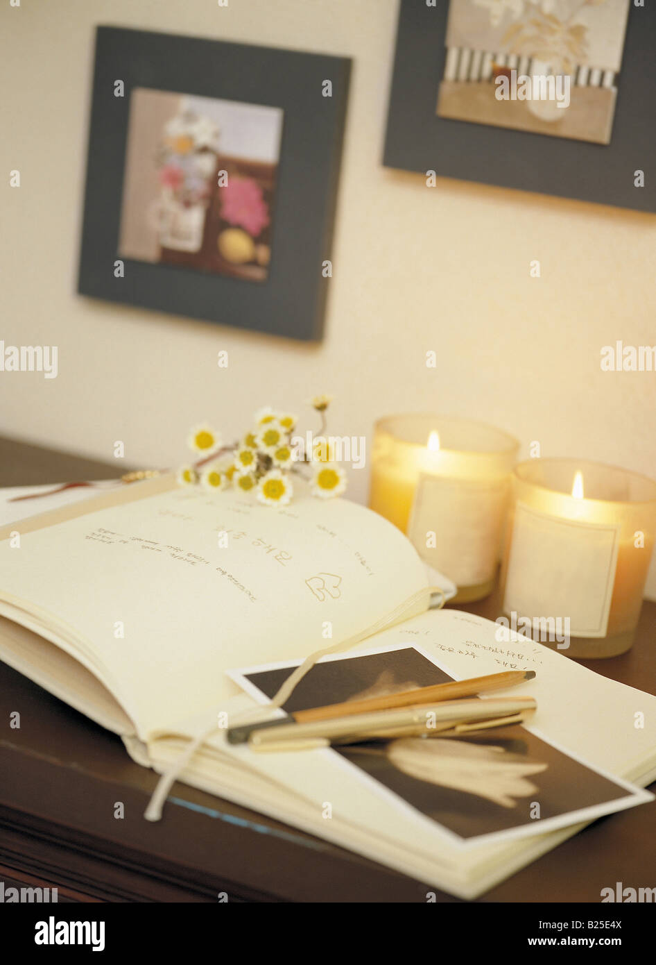Book and candle Stock Photo - Alamy
