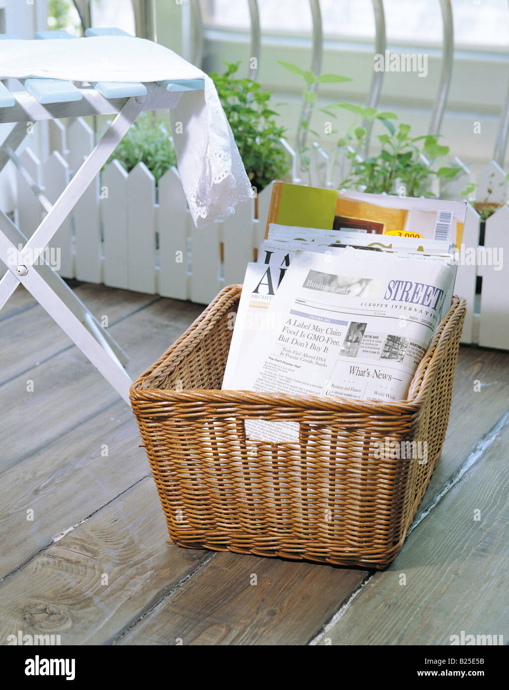 Magazine inside basket Stock Photo - Alamy