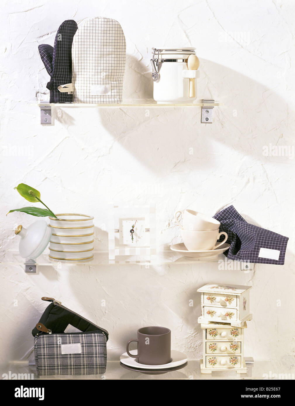 Kitchen utensils, plates and glove Stock Photo - Alamy