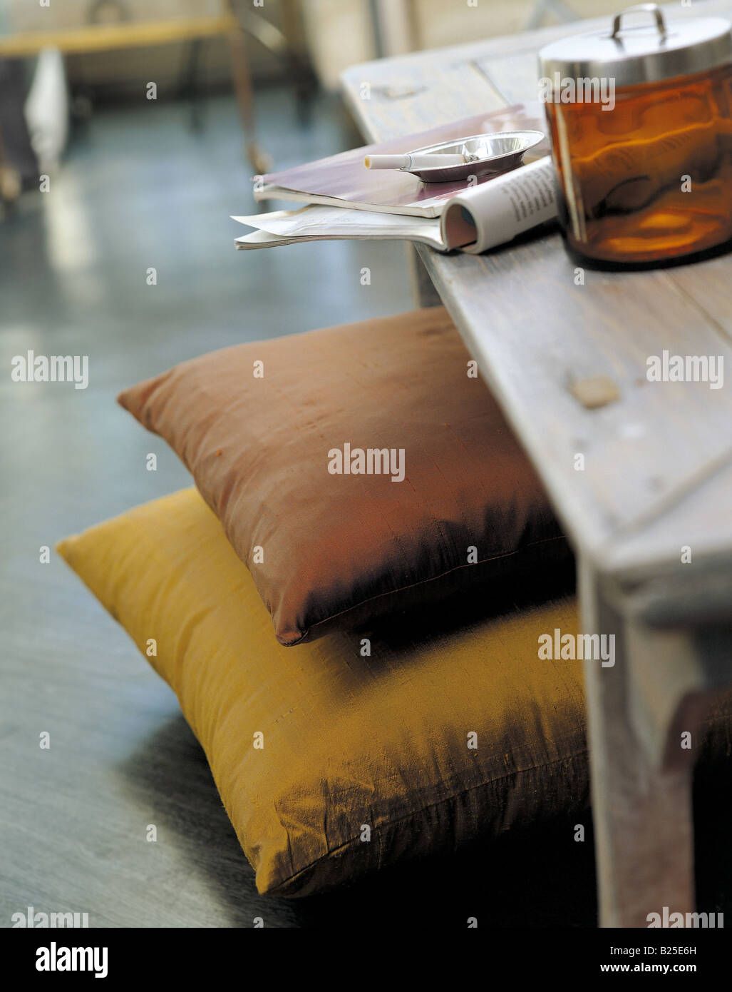 Coffee table and cushion Stock Photo - Alamy
