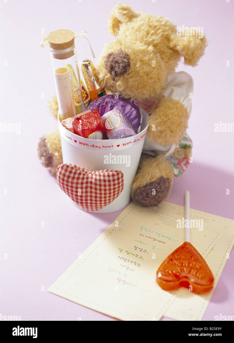 Teddy bear and candy Stock Photo - Alamy