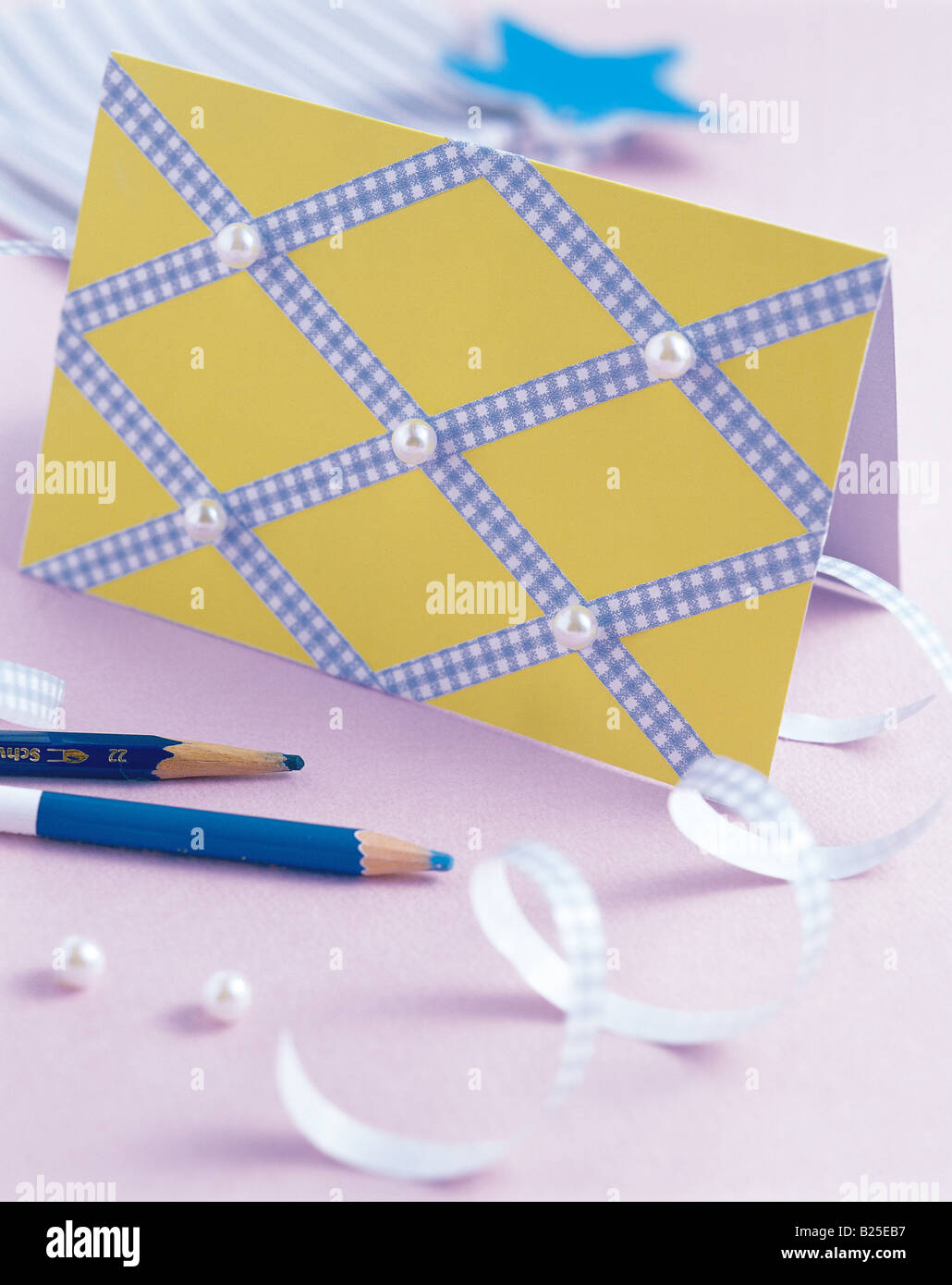 Card and pencil Stock Photo - Alamy