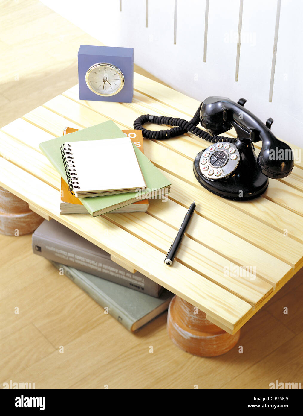 Telephone, clock and memo Stock Photo - Alamy