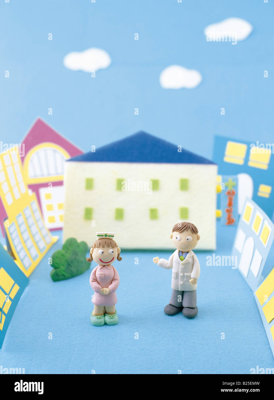 Paper clay toy, two persons Stock Photo - Alamy