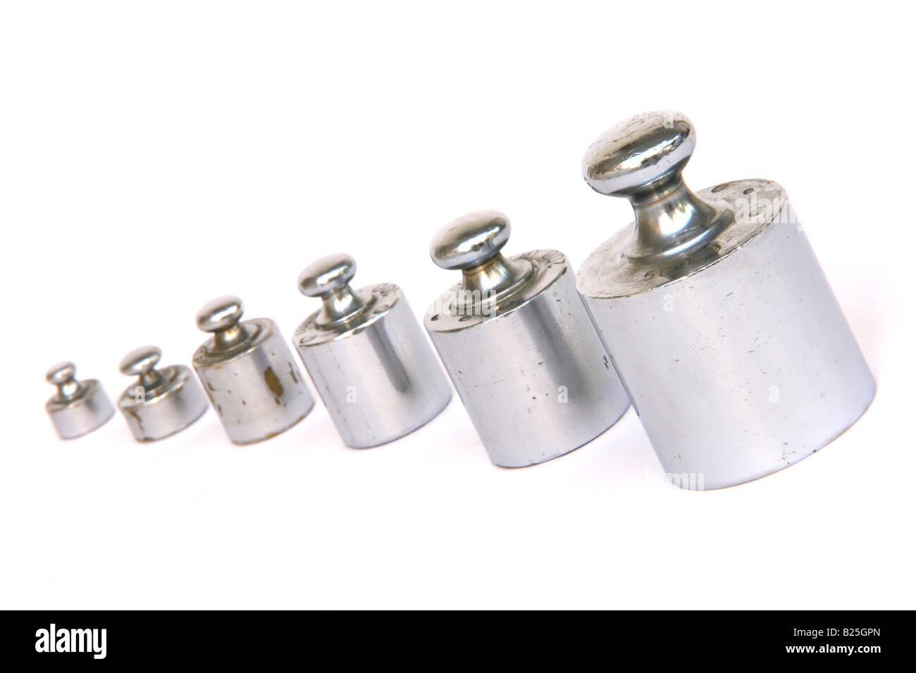 balance weight units in a row isolated on white background Stock Photo ...
