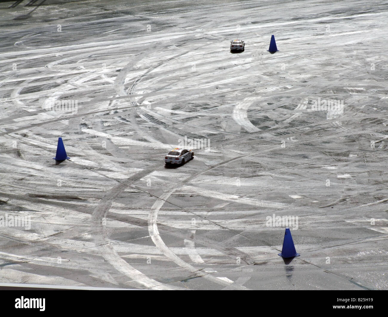 toy sports car and tyre skid marks on track Stock Photo - Alamy