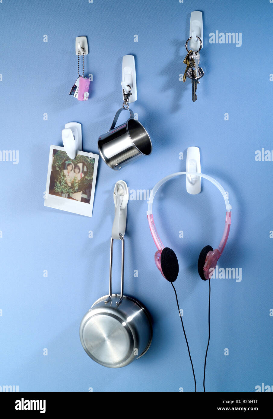 Various items hanging on the wall Stock Photo - Alamy