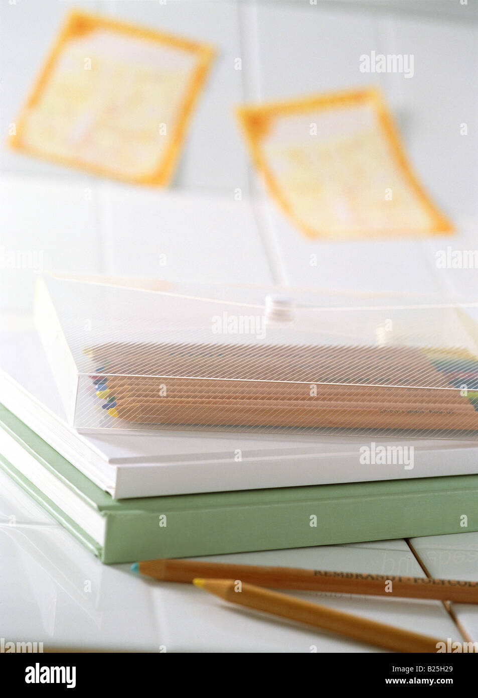 Notebooks and pencil Stock Photo - Alamy