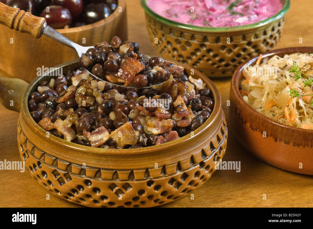 Typical Food Latvia. Grey peas with bacon and borscht Stock Photo - Alamy