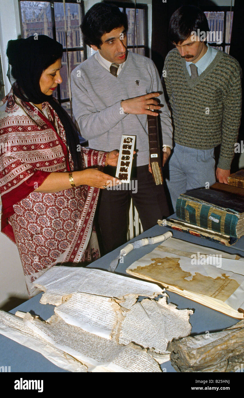 Restoration of old Quran Stock Photo - Alamy