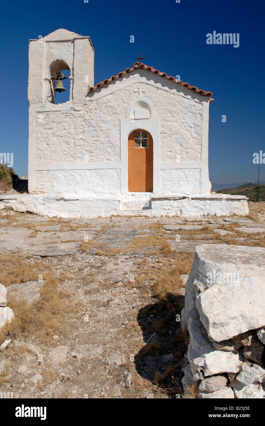 small white greek chapel in front of a deep blue sky. Samos island ...