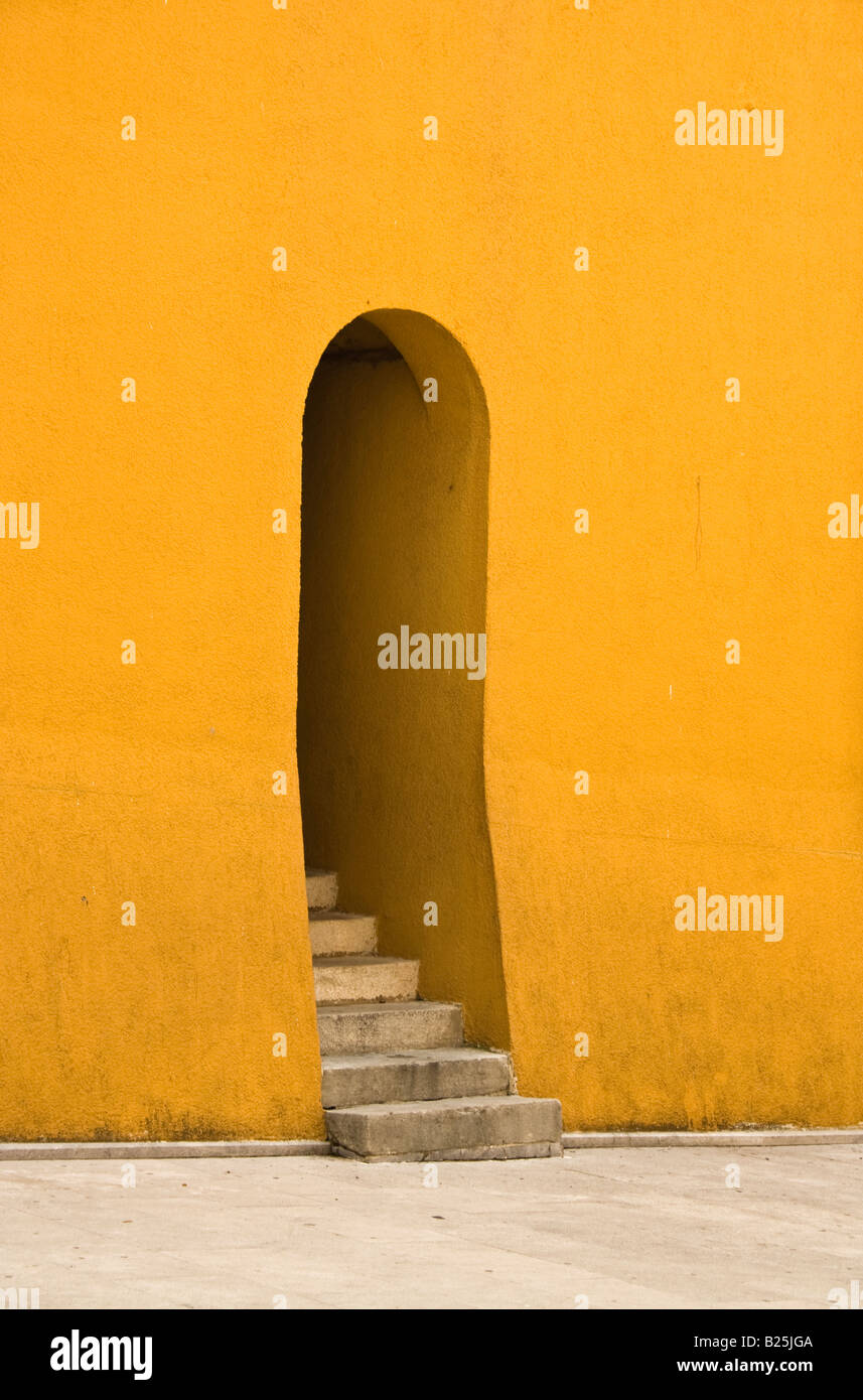 Yellow building entry Stock Photo - Alamy