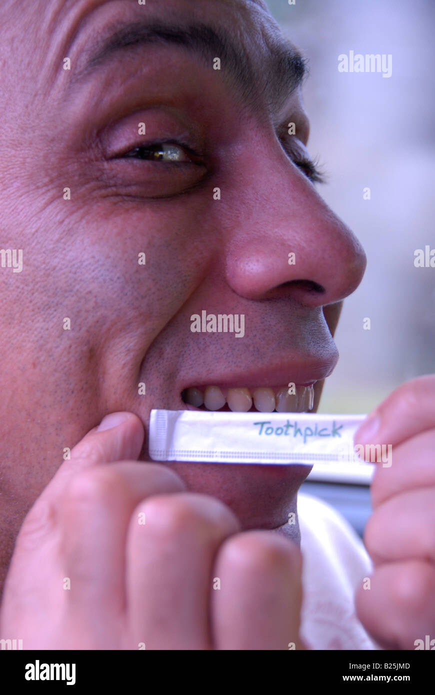 Man and toothpick hi-res stock photography and images - Alamy