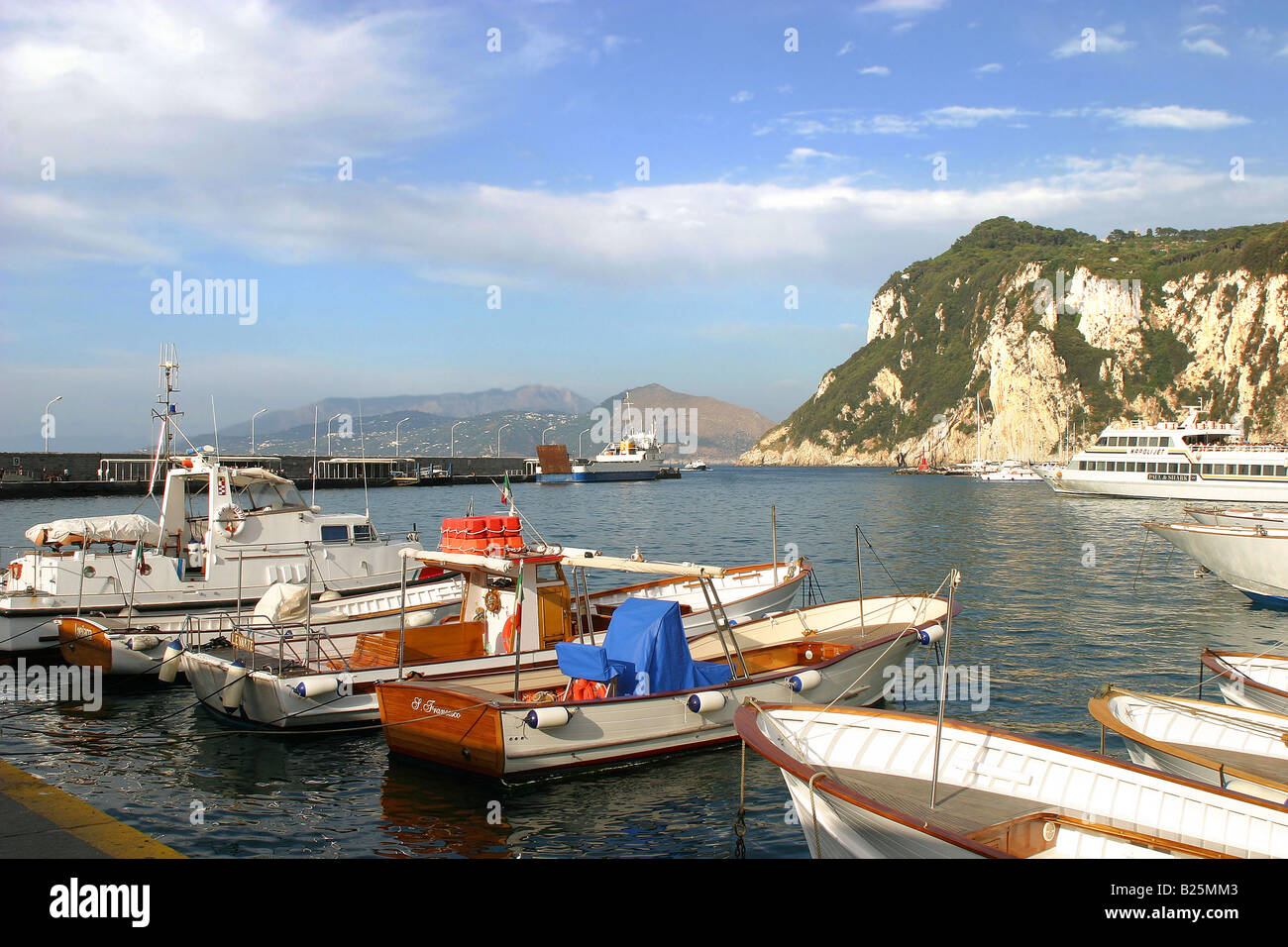 Yacht by seaport, Naples Stock Photo - Alamy