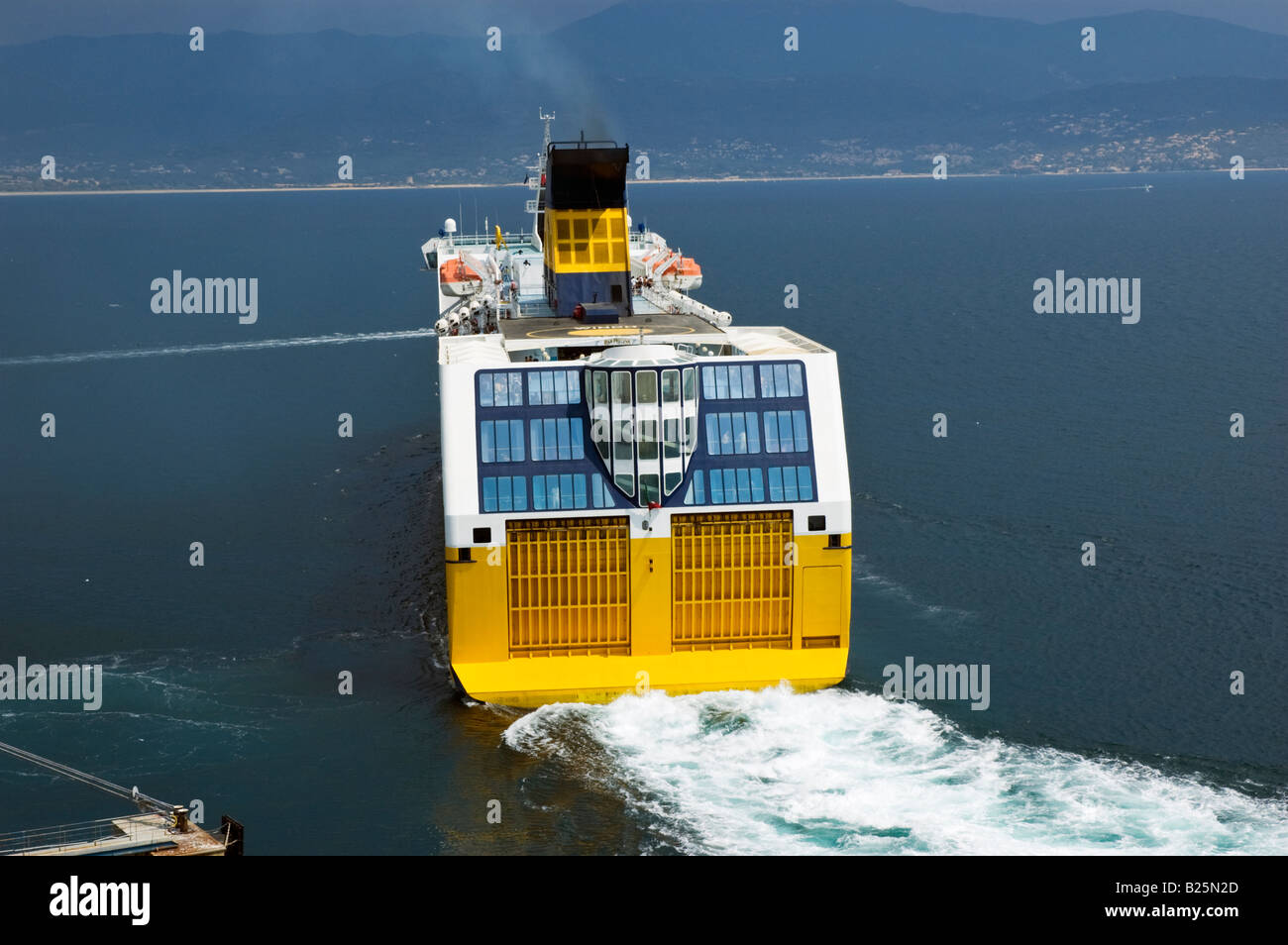 The yellow and white Mega Express Two belonging to Corsica Sardinia ...