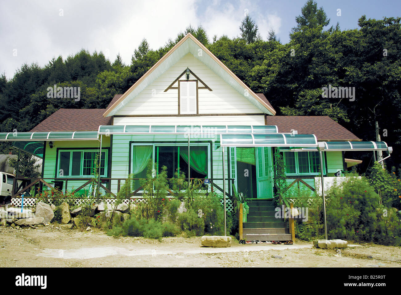House in nature environment Stock Photo - Alamy