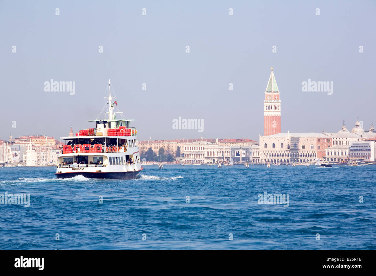 Ferry from Burano Island makes it way over the Canale di San Marco ...