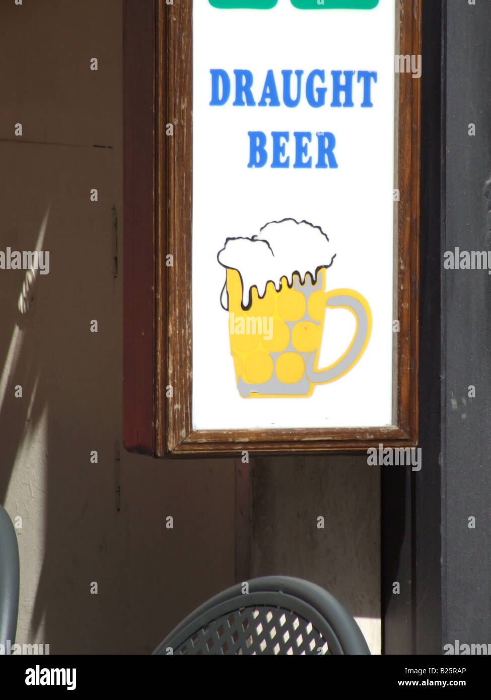 draught beer sign notice outside bar pub in city town Stock Photo - Alamy