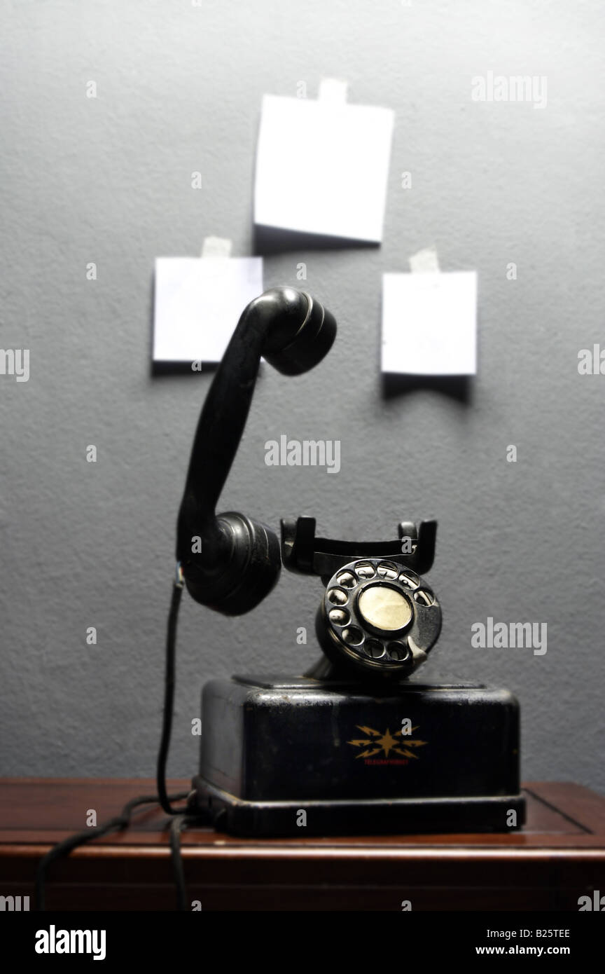 Telephone and paper Stock Photo - Alamy