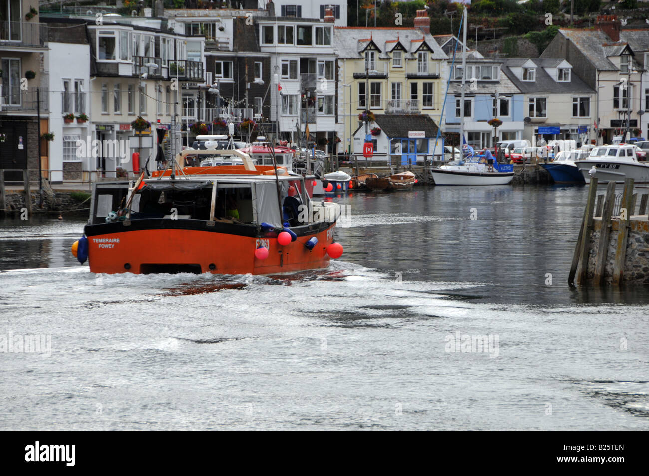 17/07/2008 Pic By Sean Hernon A Fishing boat enters Looe Harbour Stock ...
