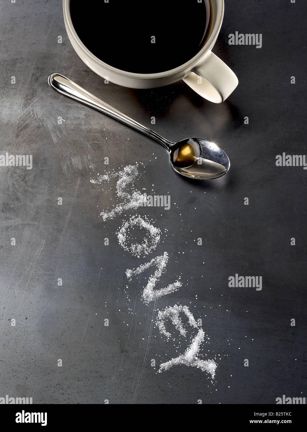 Spoon and cup Stock Photo - Alamy