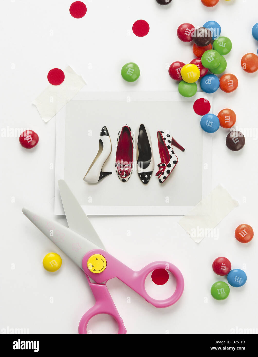 Chocolates and scissors Stock Photo - Alamy