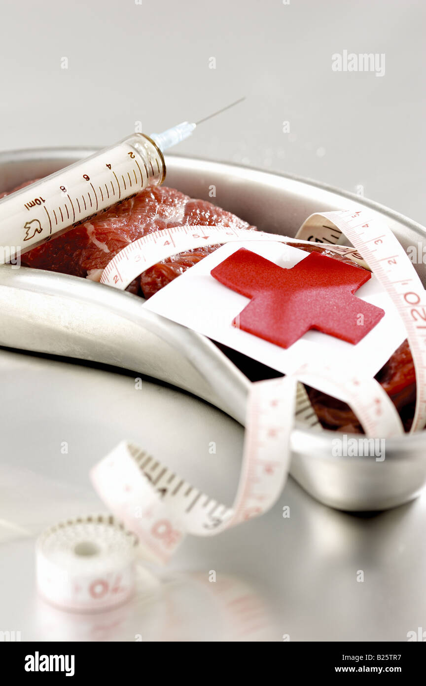 Syringe and red cross Stock Photo - Alamy