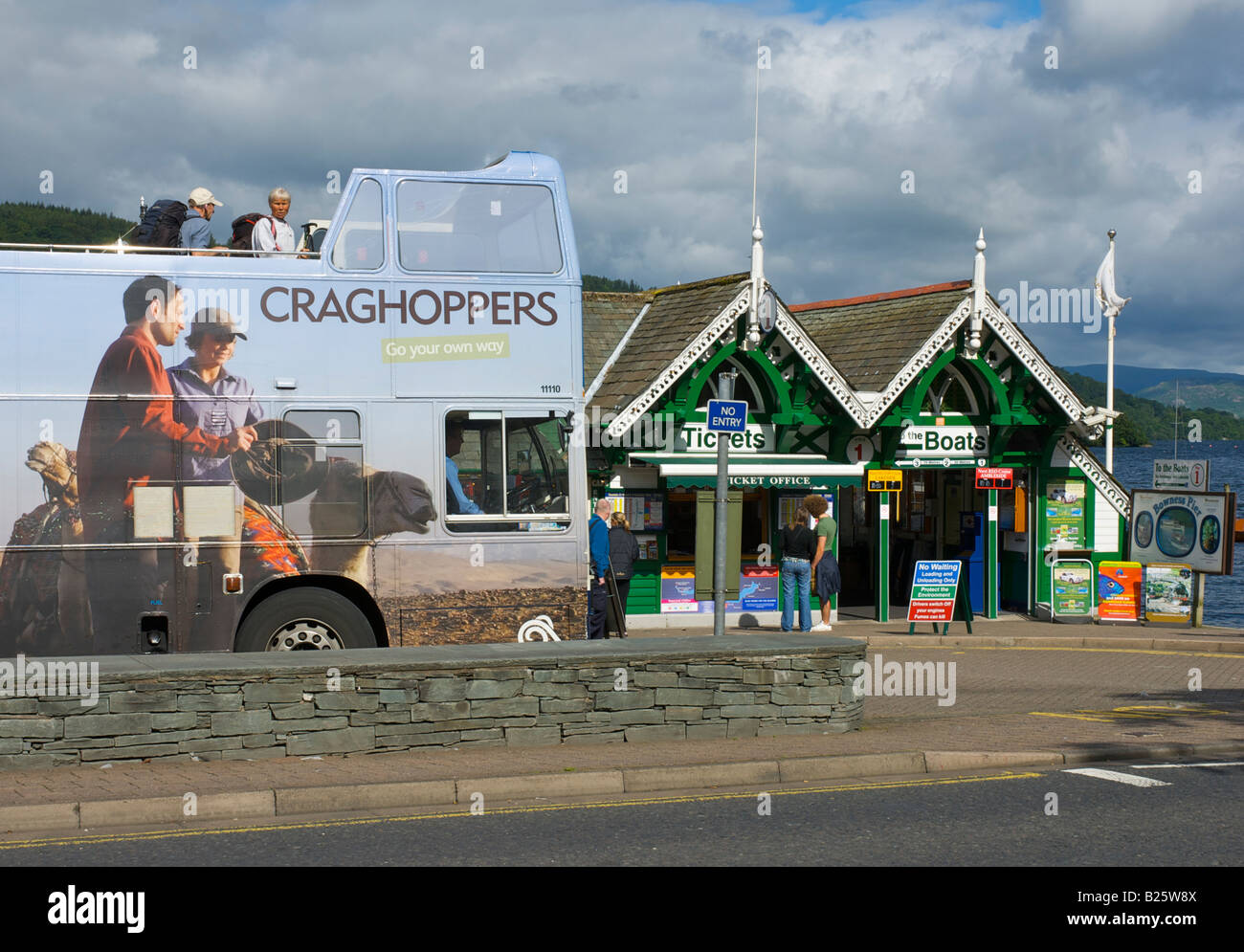 Open-topped bus parked in Bowness Bay, Lake Windermere, Lake District ...