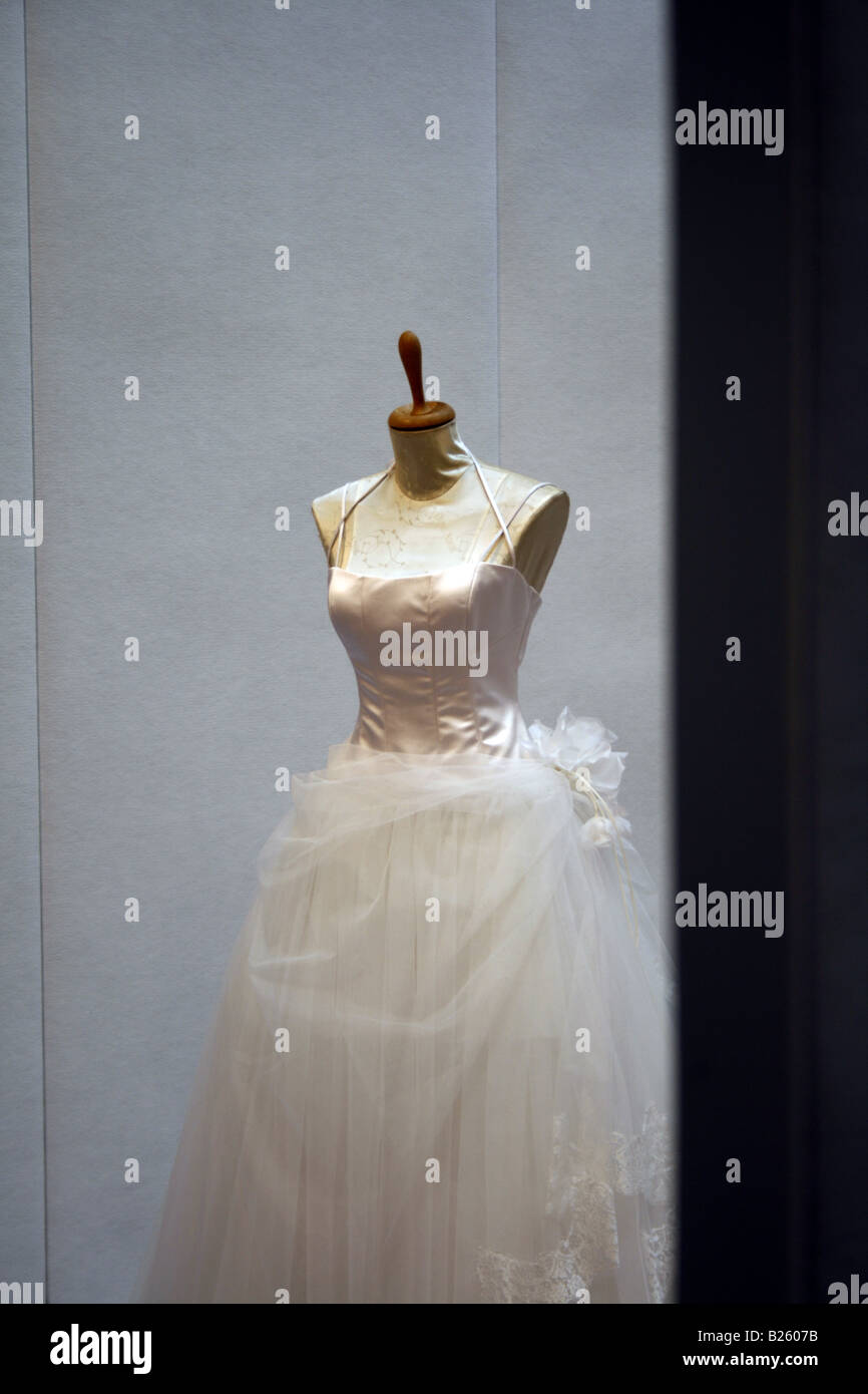 wedding dress on display in shop window Stock Photo - Alamy