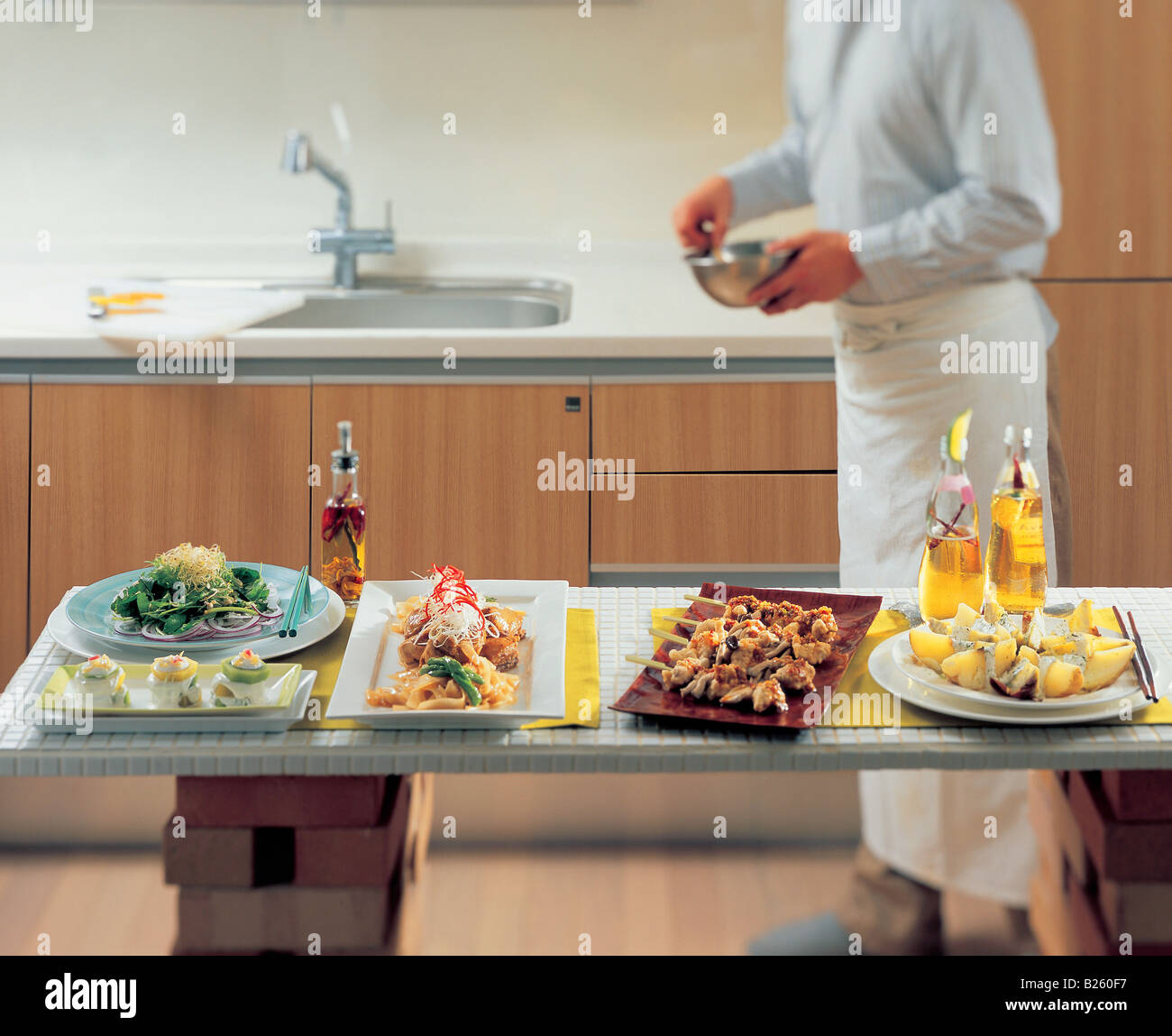 Man cooking in kitchen Stock Photo - Alamy