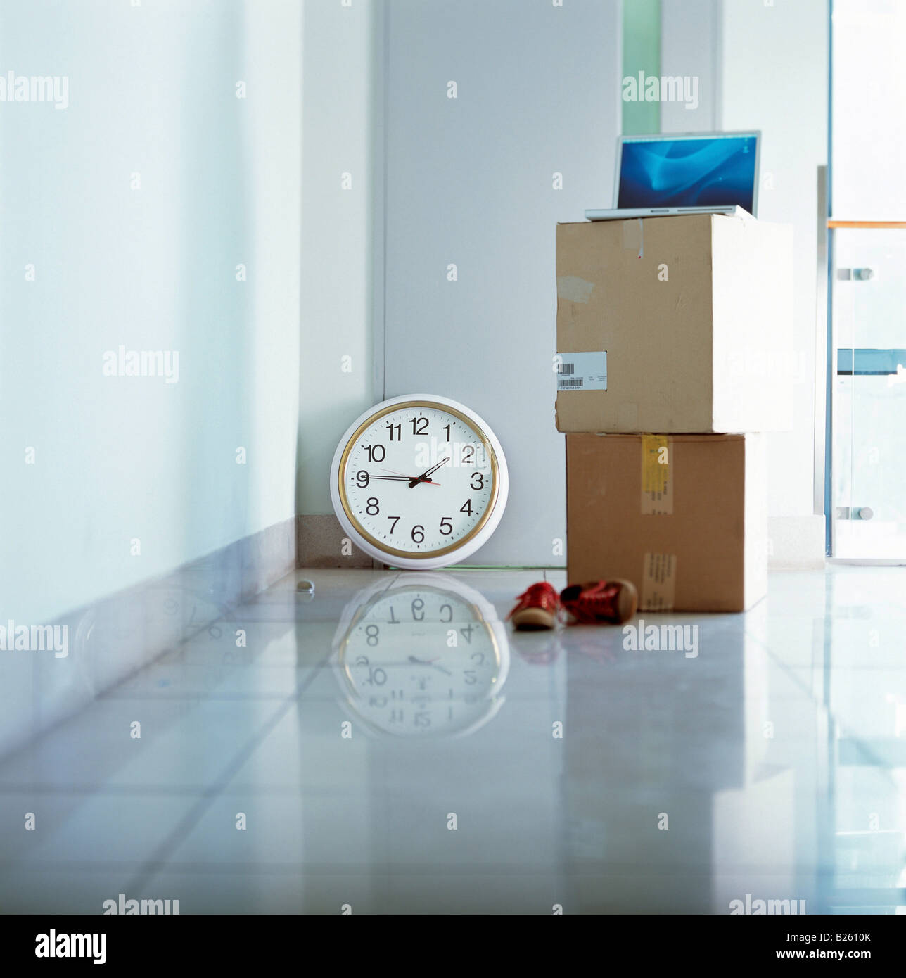 Clock and boxes Stock Photo - Alamy