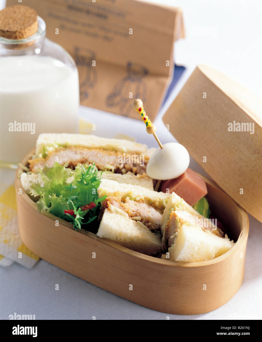 Lunch box sandwich and a bottle of milk Stock Photo - Alamy