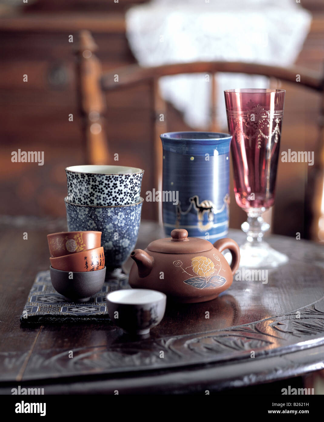 Teacups on table Stock Photo - Alamy