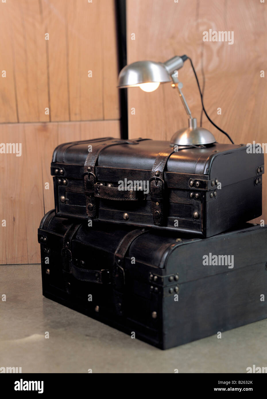 Table lamp on luggage Stock Photo - Alamy