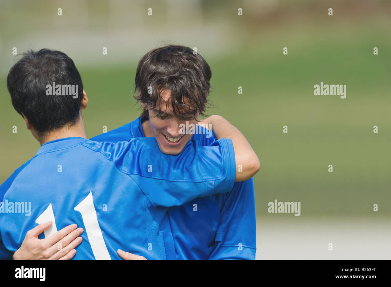 Football players hugging hi-res stock photography and images - Alamy