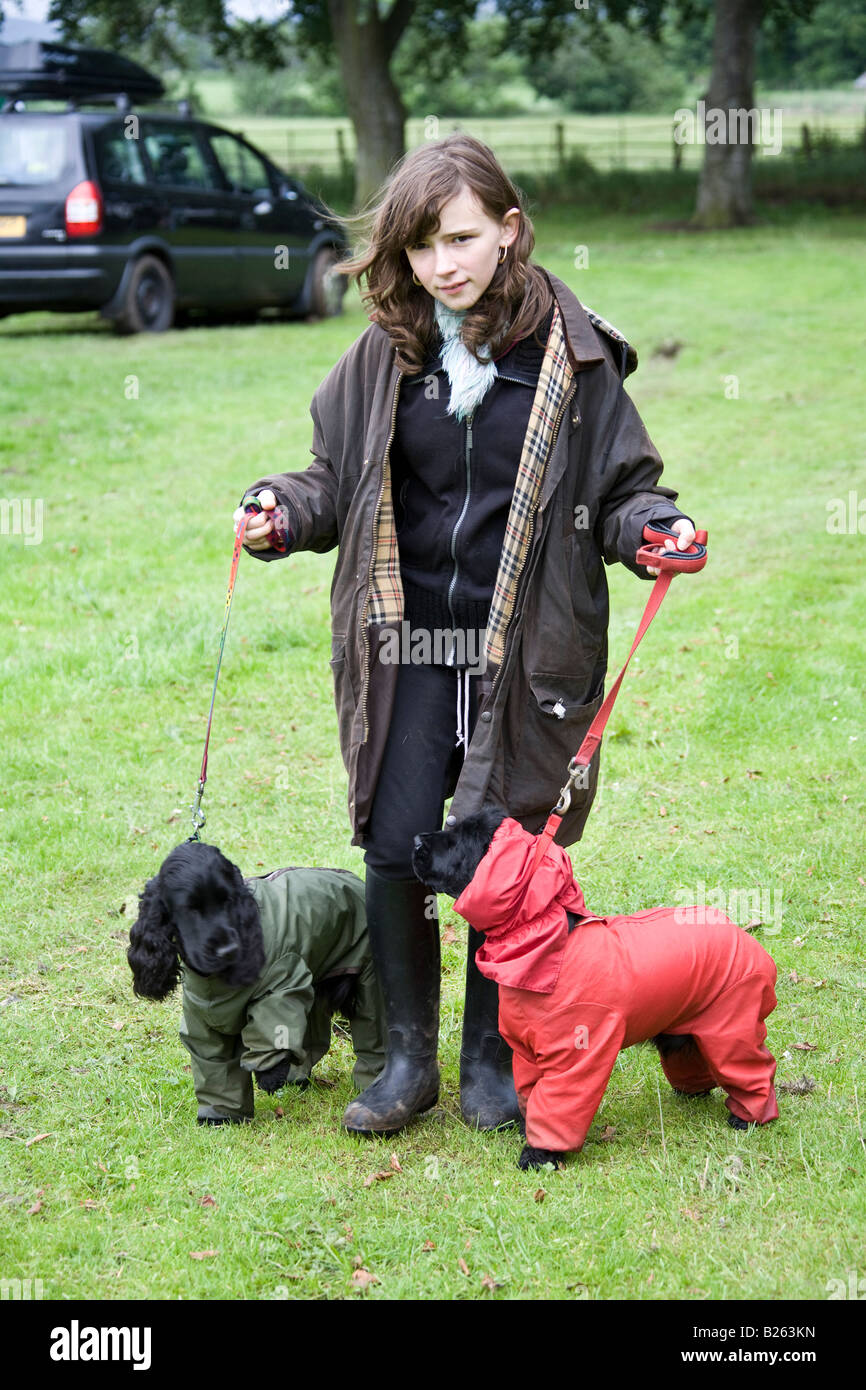 Two dogs in red coats hi-res stock photography and images - Alamy
