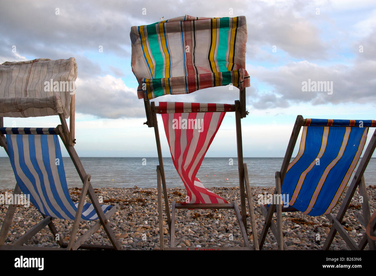 Deckchairs on the beach in Beer, Devon Stock Photo - Alamy