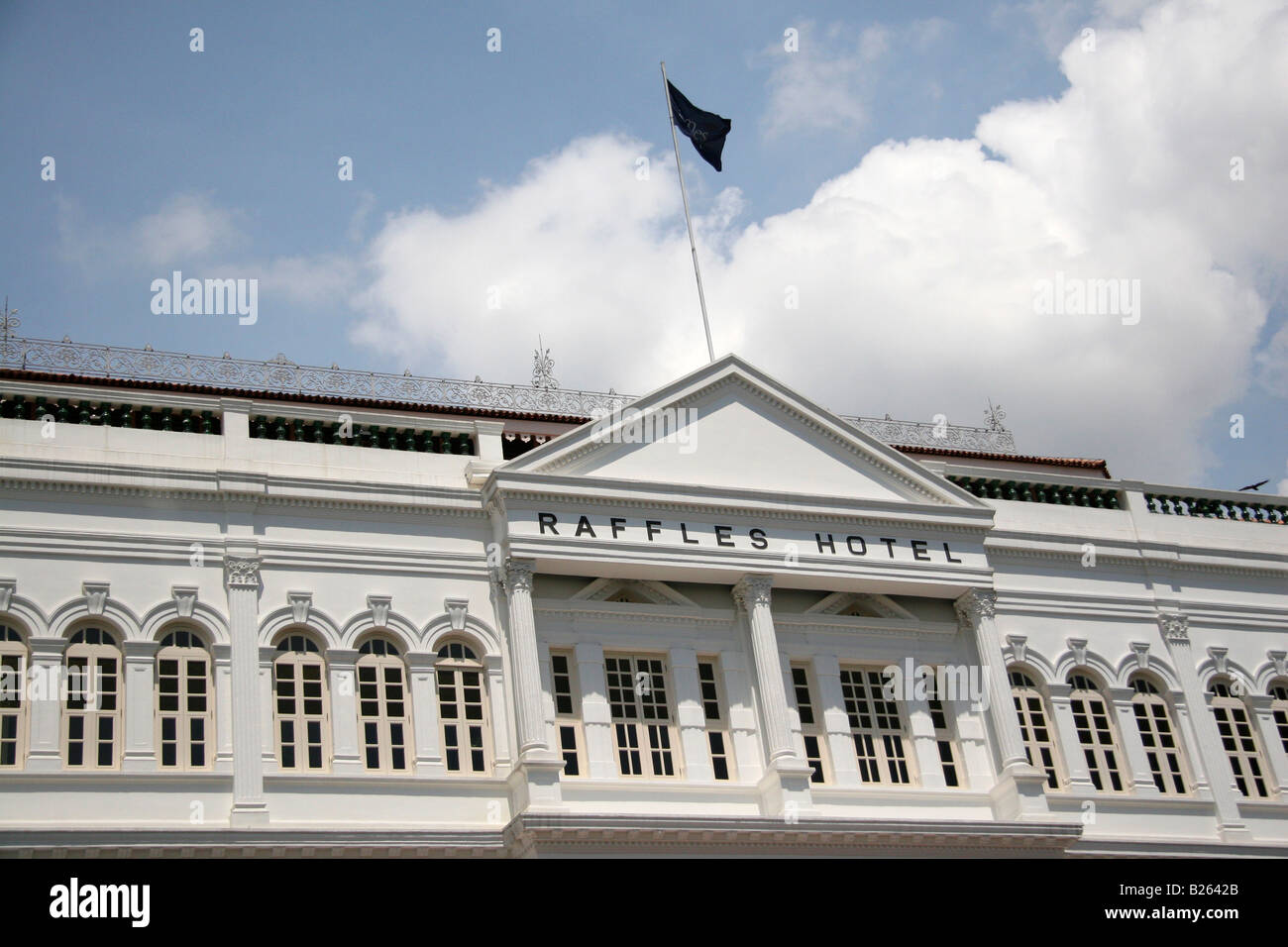 The facade of Raffles Hotel in Singapore. The hotel is the watchword ...