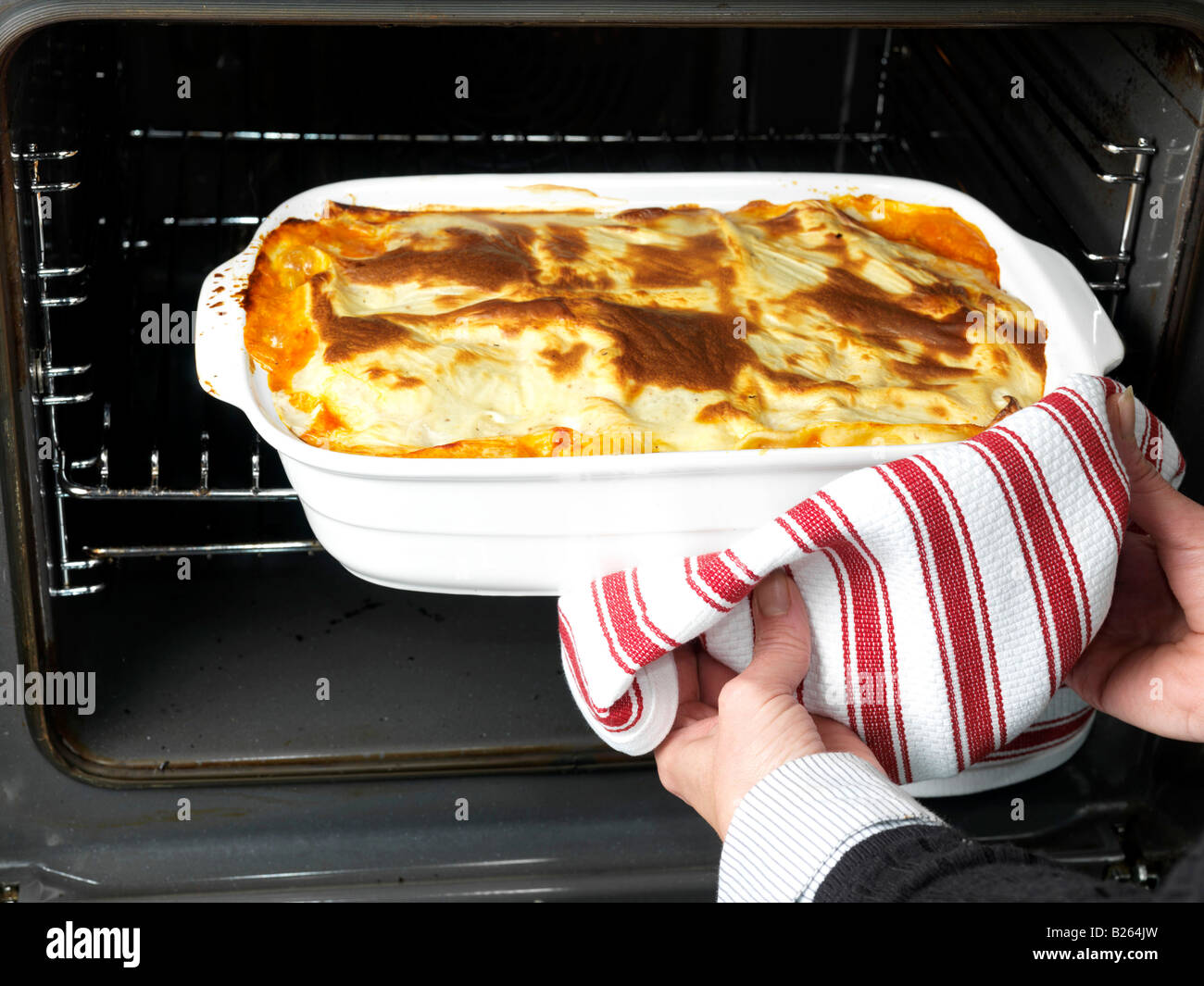 Woman lasagne hi-res stock photography and images - Alamy
