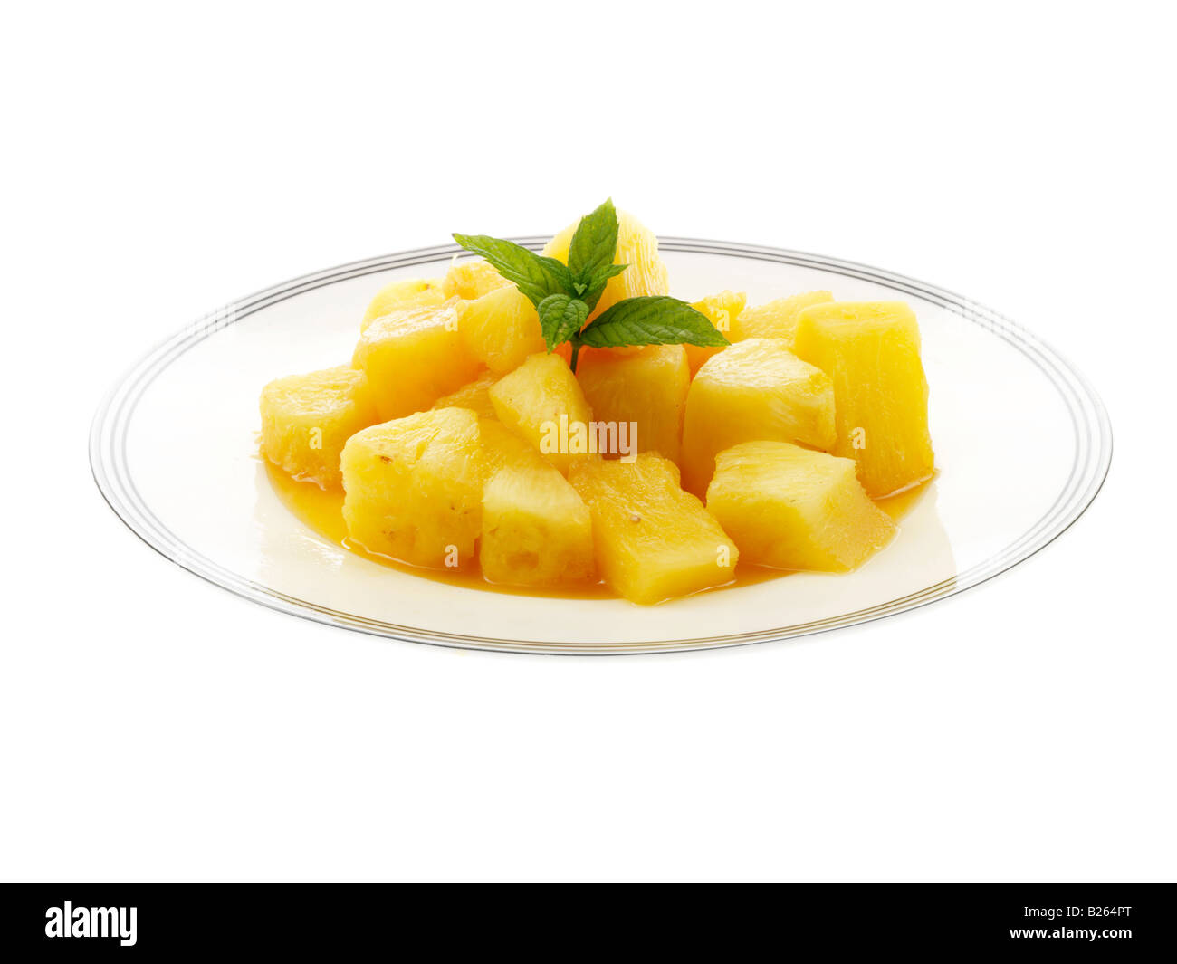 Poached Pineapple in Orange juice and Brown Sugar Stock Photo - Alamy