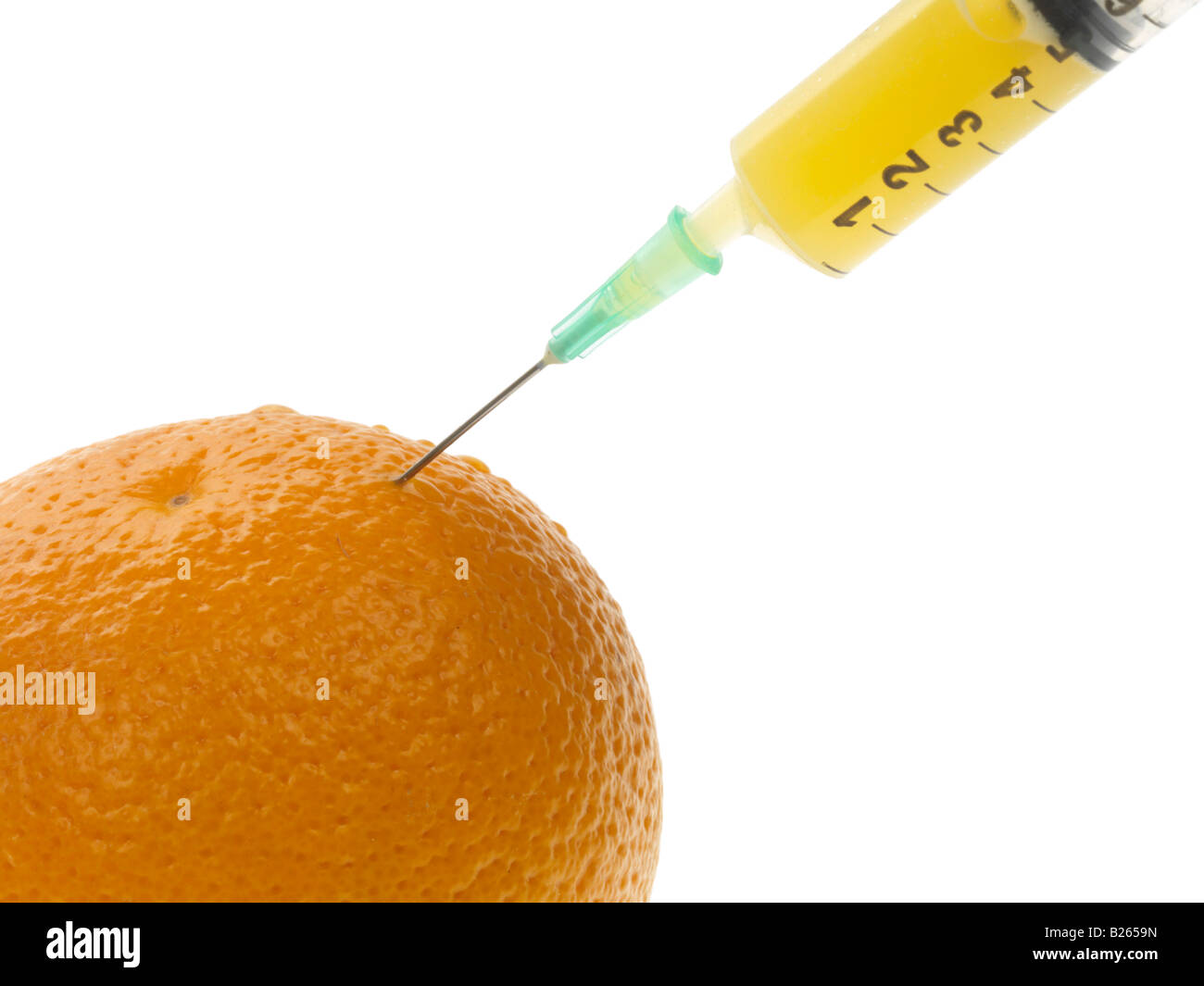 Injecting an Orange Stock Photo - Alamy