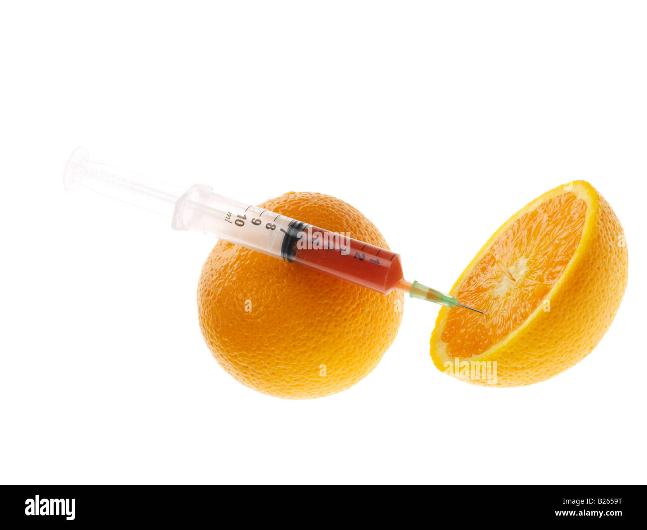 Injecting an Orange Stock Photo - Alamy