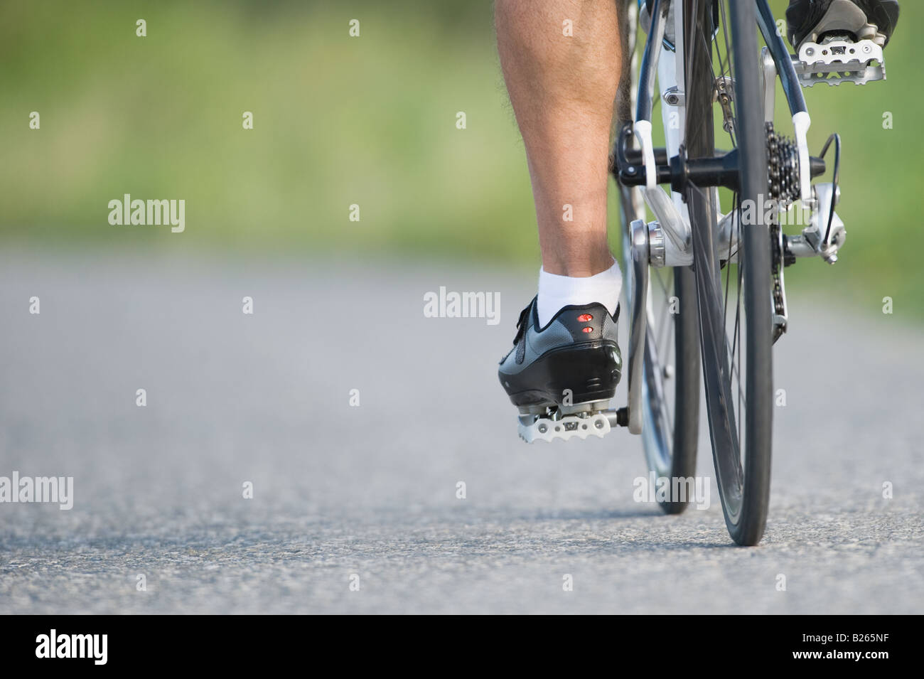 Feet pedaling hi-res stock photography and images - Alamy